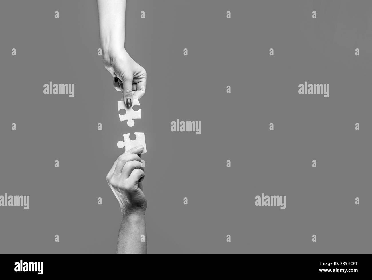 Hands connecting puzzle. Puzzles. Hand of the child and hand of mother ...