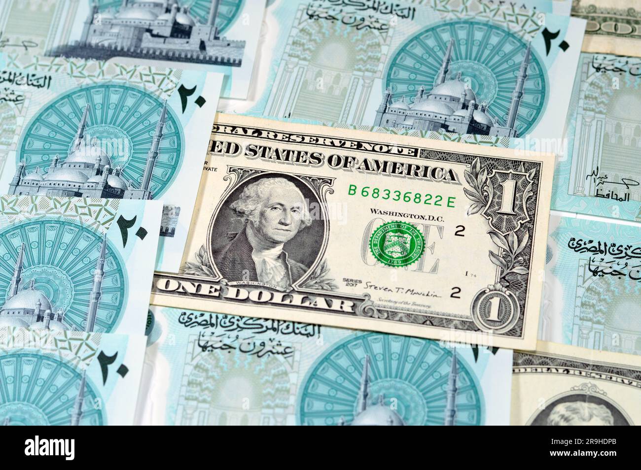 Background of USD American dollars money bills with the new Egyptian 20 ...