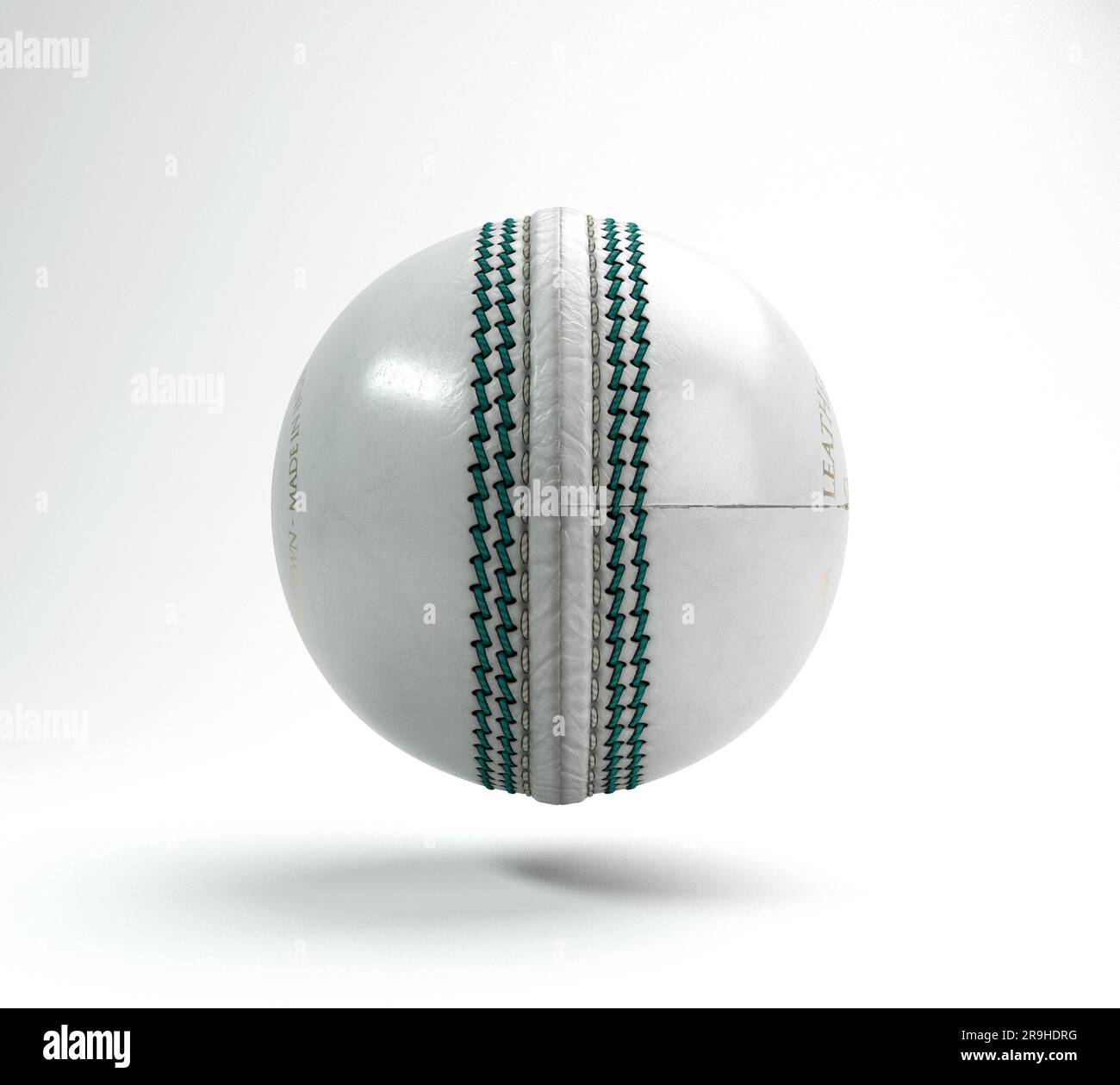 A regular white cricket ball with green stitching on an isolated ...