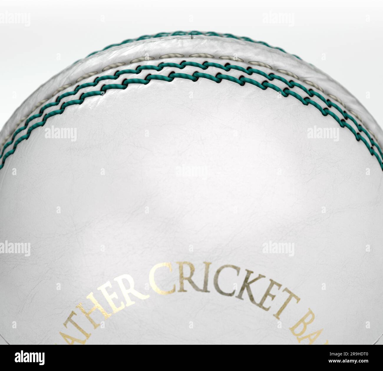 A regular white cricket ball with green stitching on an isolated ...