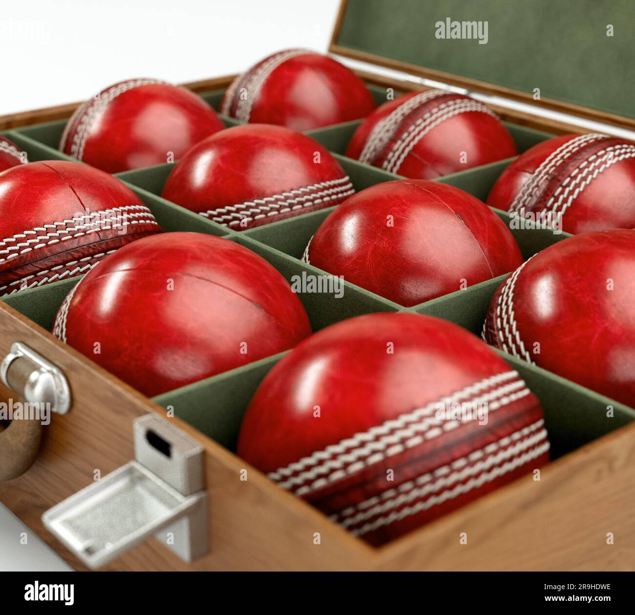 Twelve generic red cricket balls in a wooden display box lined with ...
