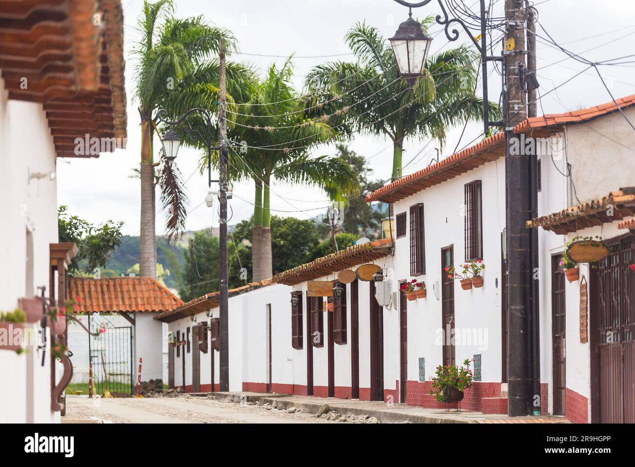 street view of traditional colonial town in Colombia, South America ...