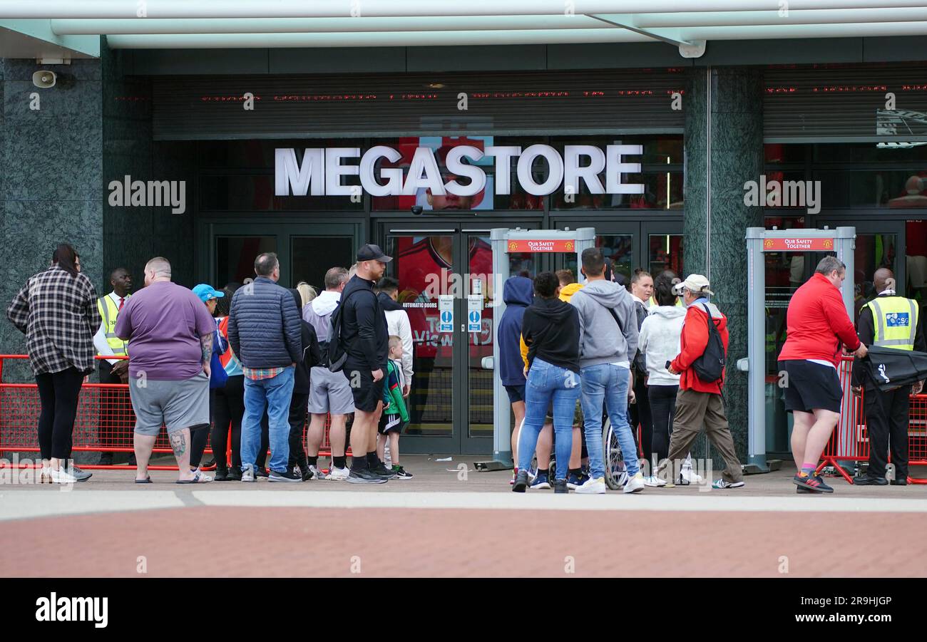Manchester United fans gather outside of Old Trafford Megastore as ...