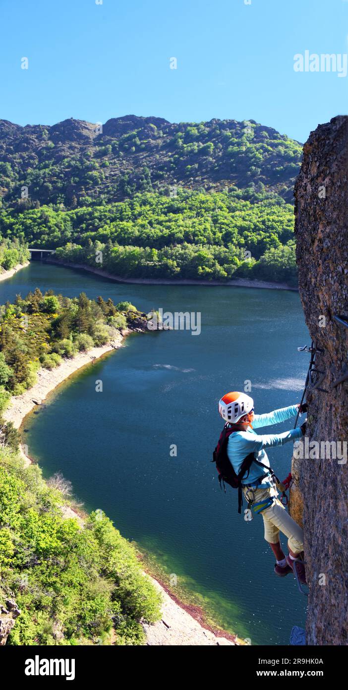 FRANCE, LOZERE (48) VILLEFORT, VIA FERRATA OVER THE LAKE Stock Photo ...