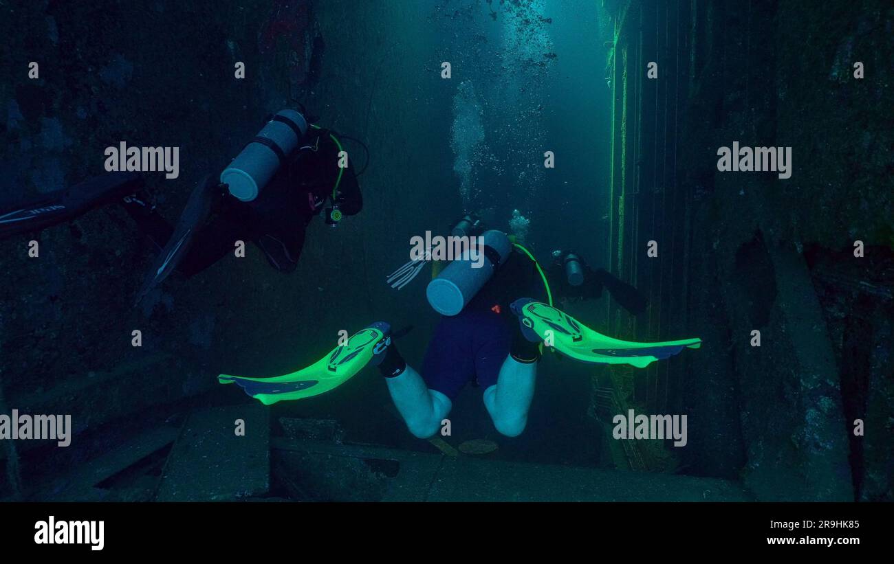 Scuba diver swim inside of ferry Salem Express shipwreck, Red sea ...