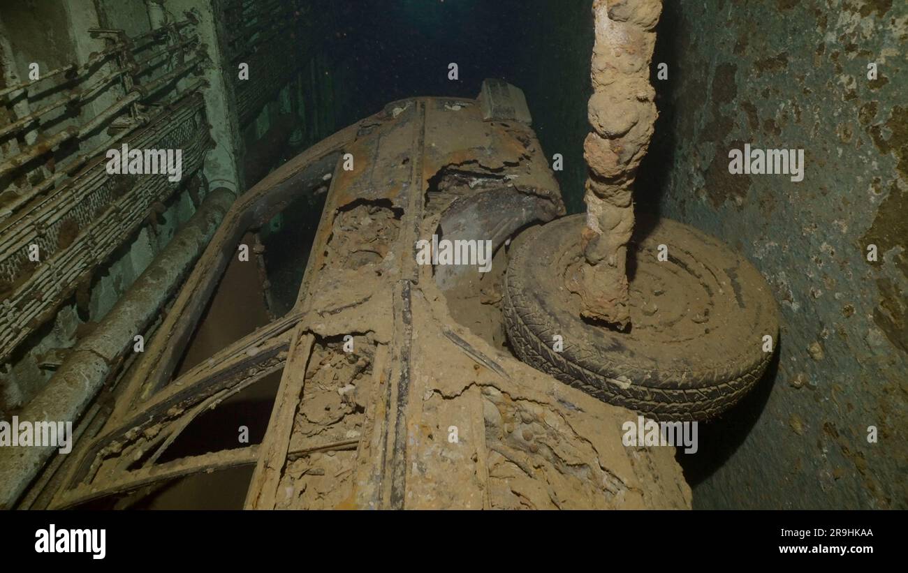 Car lying inside cramped hold of ferry Salem Express shipwreck, Red sea ...