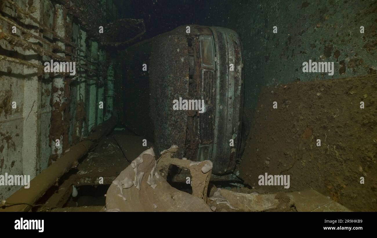 Car lying inside cramped hold of ferry Salem Express shipwreck, Red sea ...