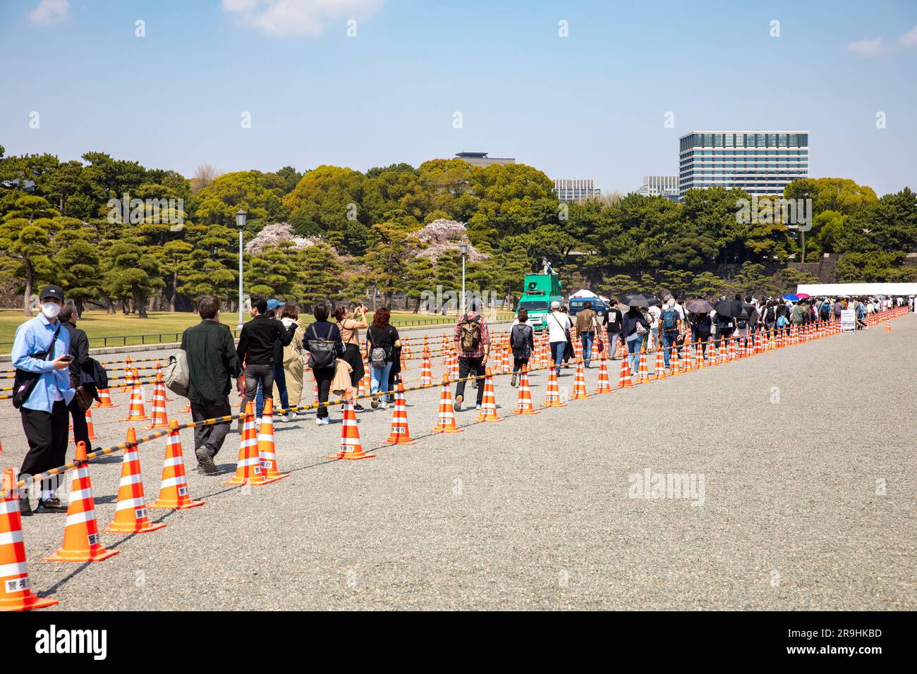 Tokyo Japan, 2023, people queue for security police check of bags to ...
