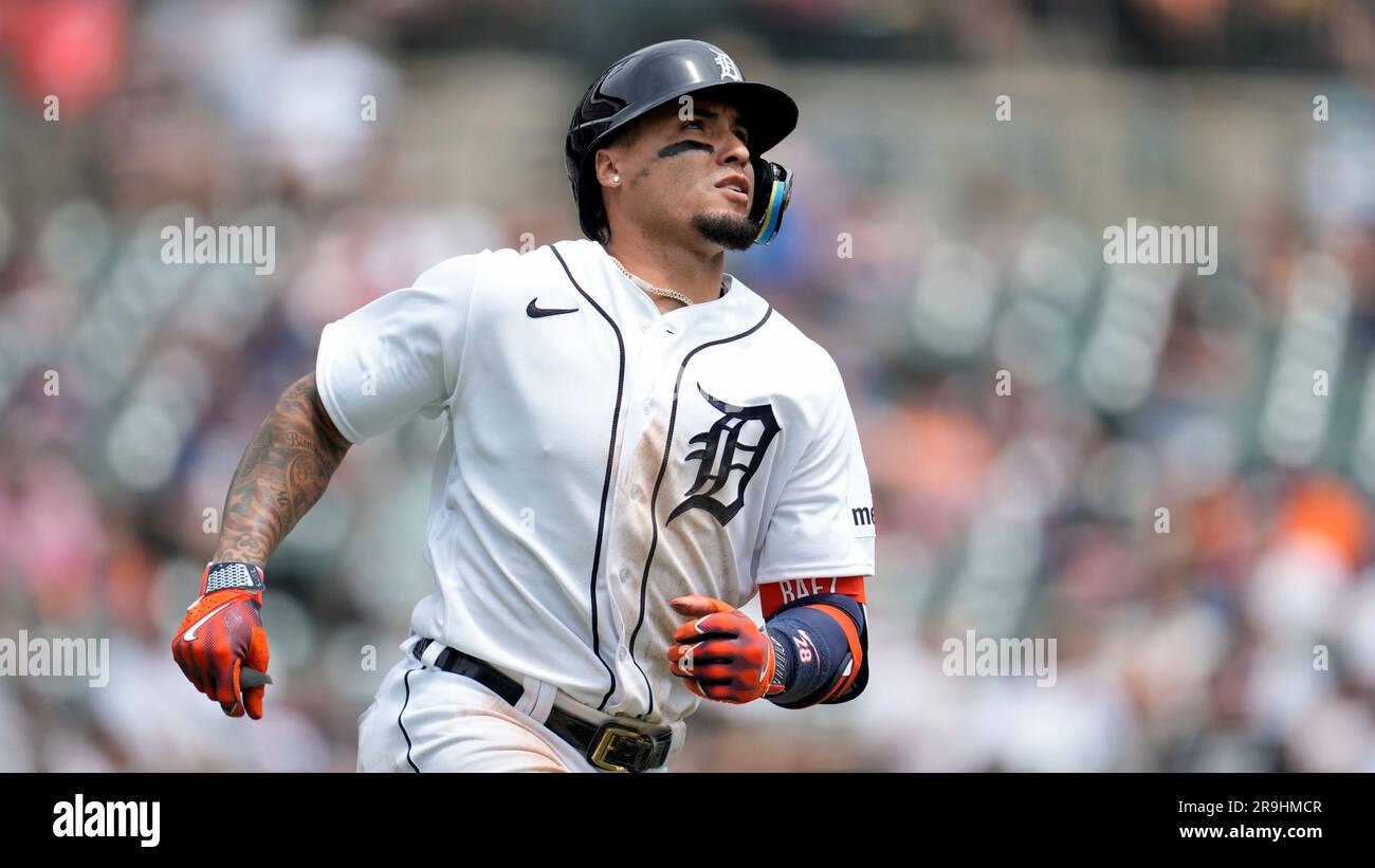 Detroit Tigers' Javier Baez (28) runs out a fly ball against the ...