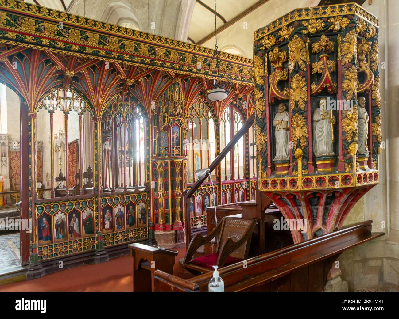Rood screen and pulpit inside village parish church of Saint Andrew ...