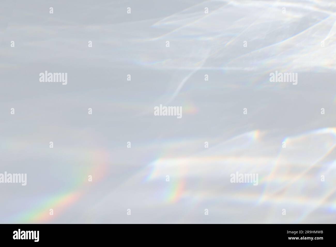 Dreamy surreal rainbow light refraction texture overlay effect on white ...