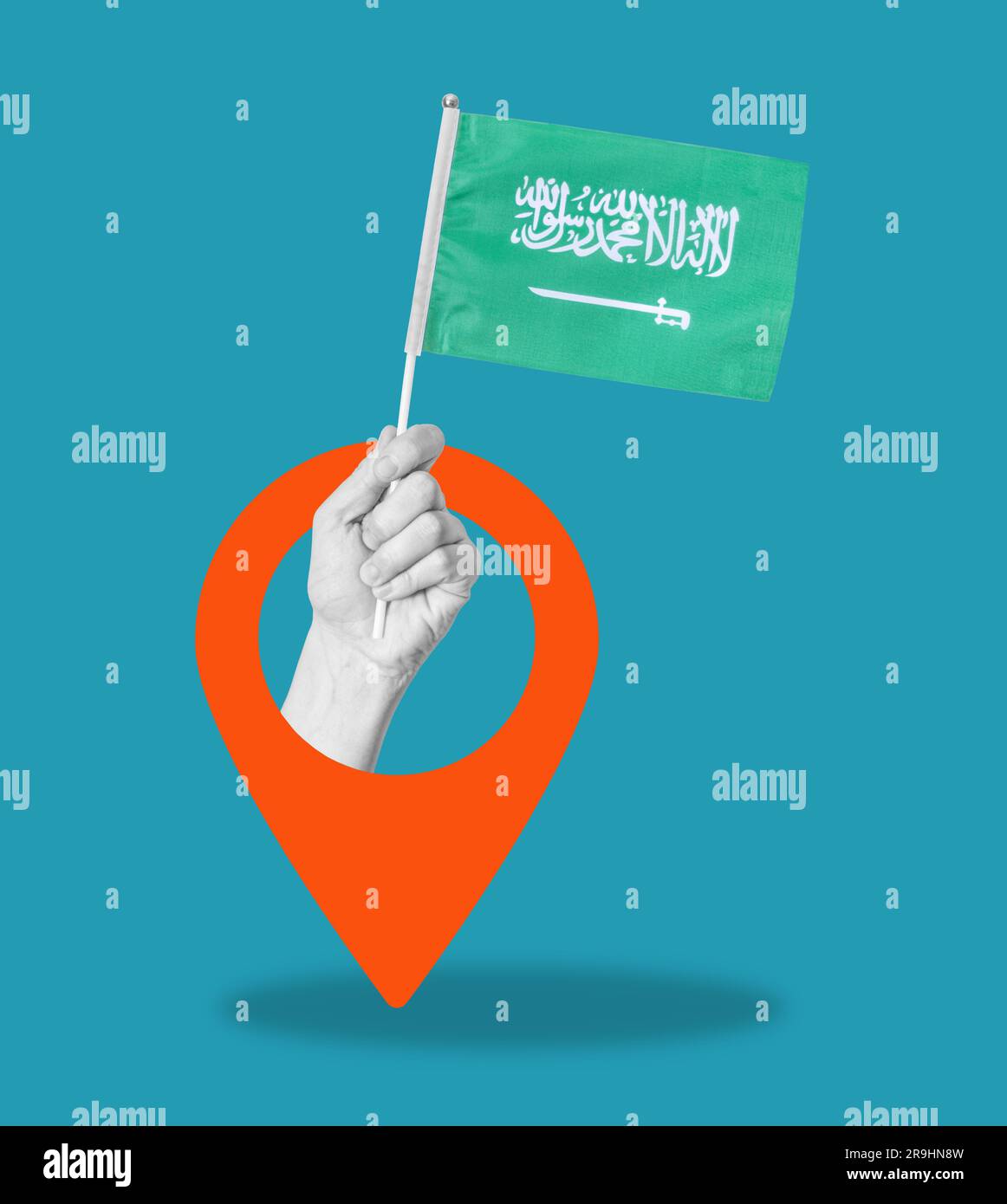 Art collage, hand with the flag of Saudi Arabia on a blue background ...