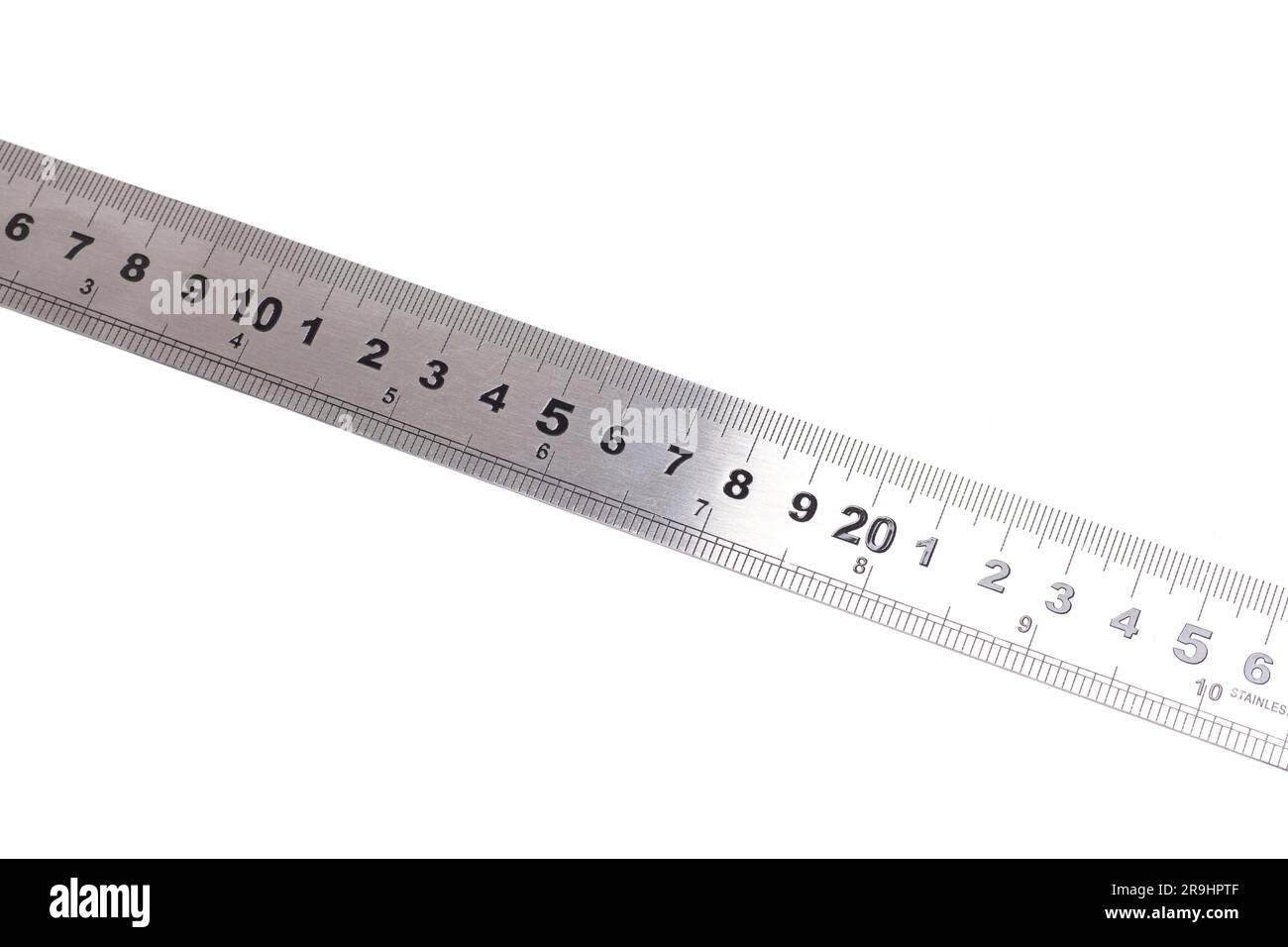 Metal Ruler isolated on white background Stock Photo - Alamy