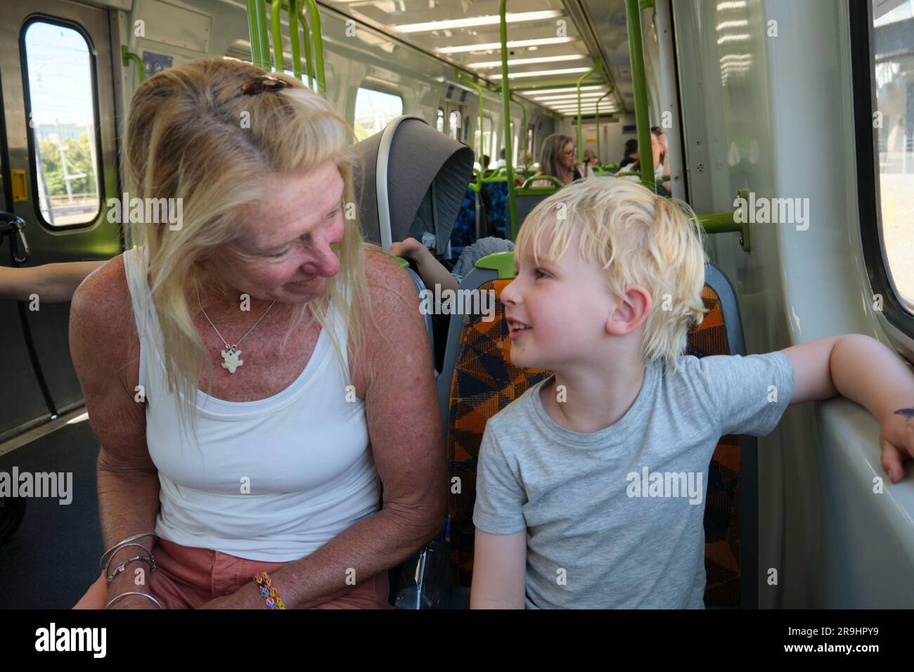 Grandma Taking Grandson On Train Stock Photo Alamy