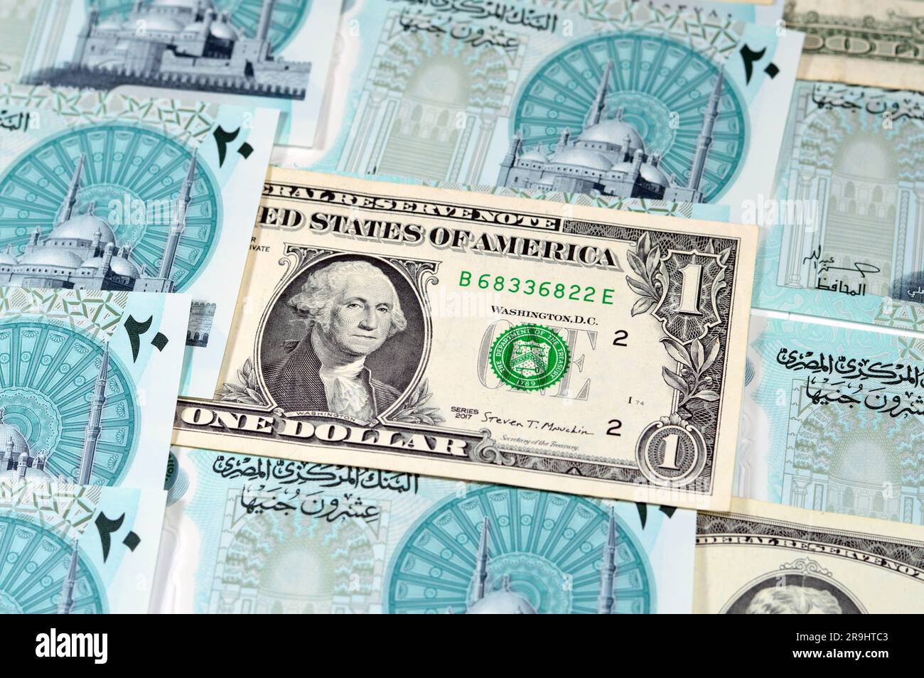 Background of USD American dollars money bills with the new Egyptian 20 ...