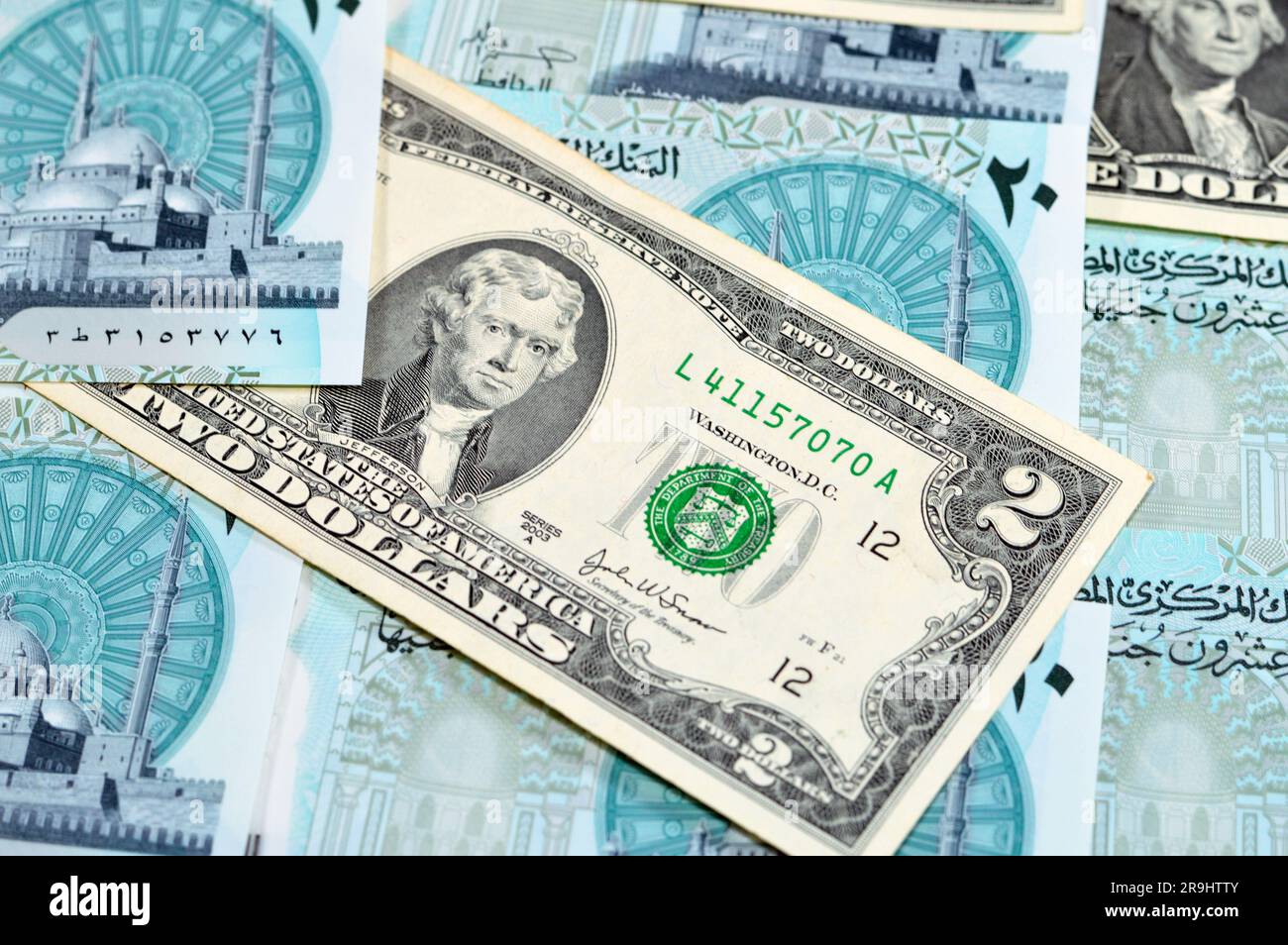 Background of USD American dollars money bills with the new Egyptian 20 ...