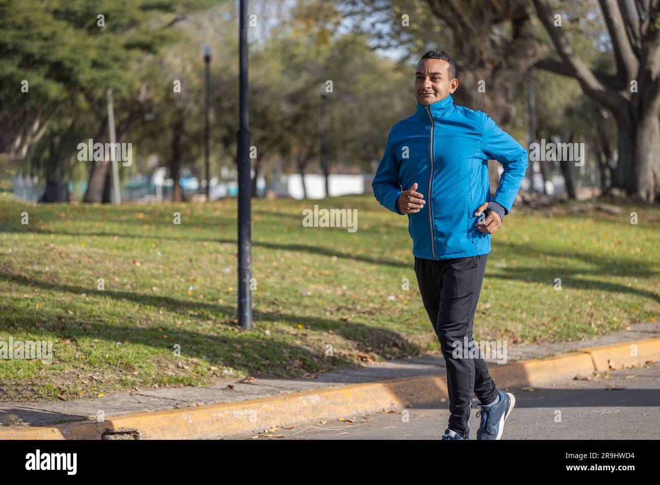Young athletic guy runs hi-res stock photography and images - Alamy