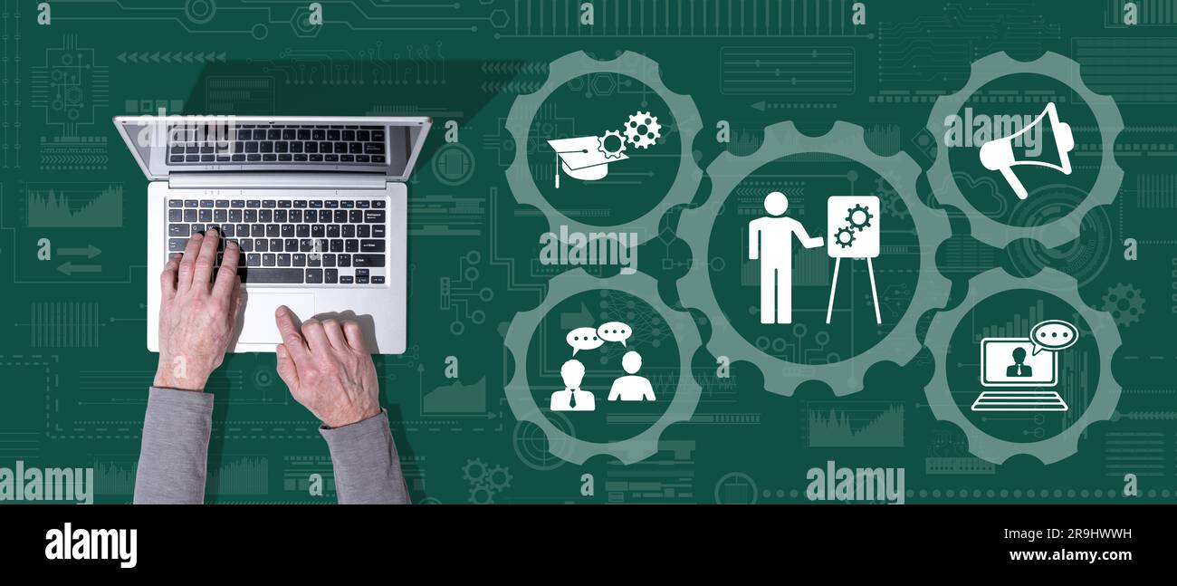 Top view of hands using laptop with symbol of training concept Stock ...