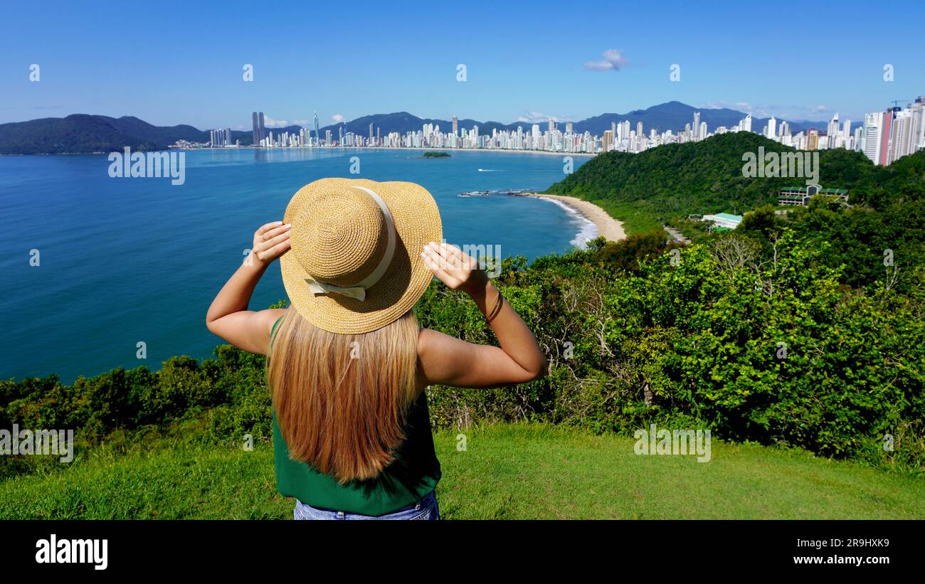 Vacation in Brazil. Panoramic view of traveler girl on viewpoint ...