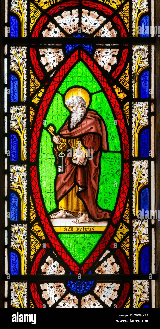 Stained glass window of Saint Peter inside village parish church ...