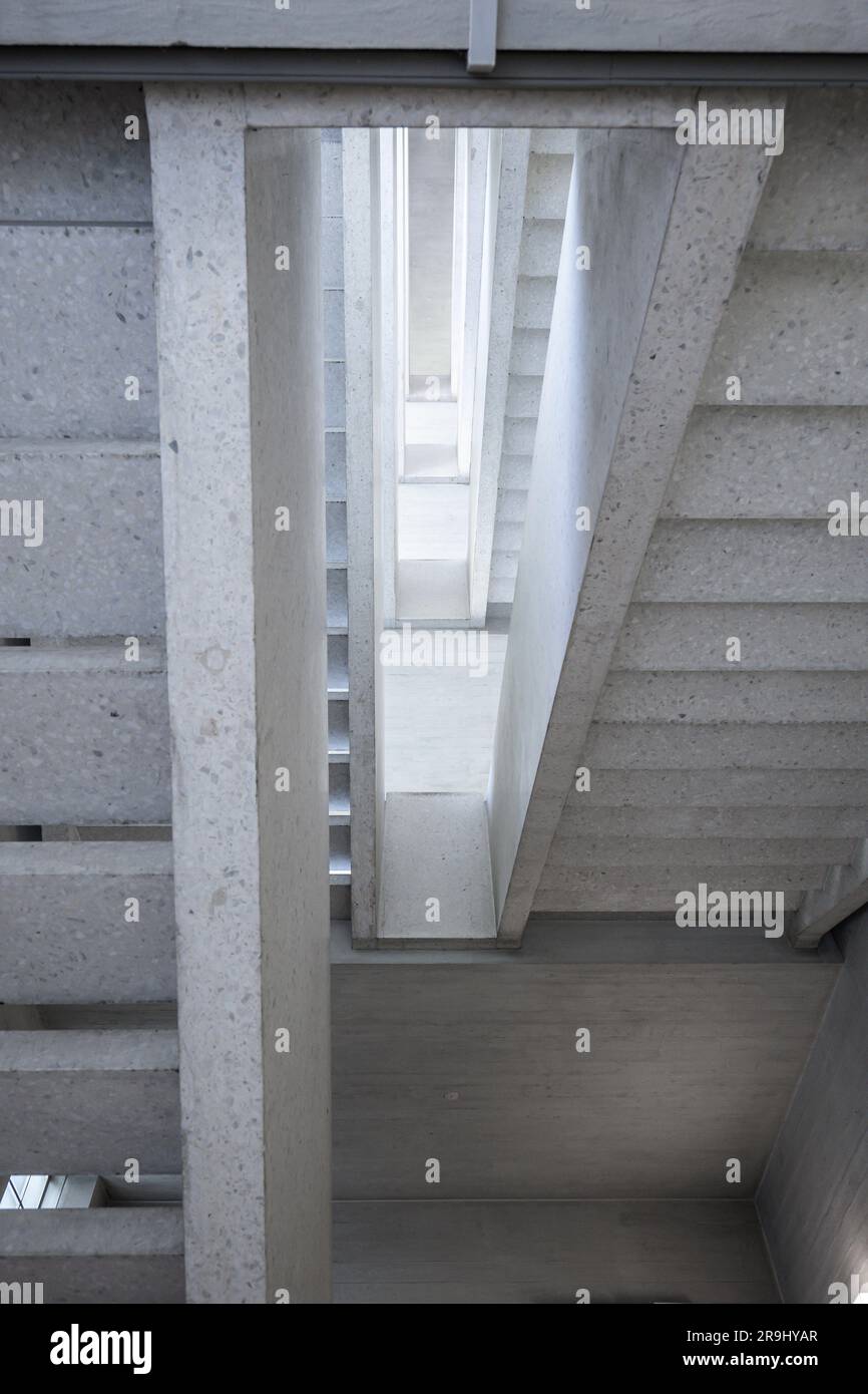 Concrete stairs in the hallway of an empty public access building ...