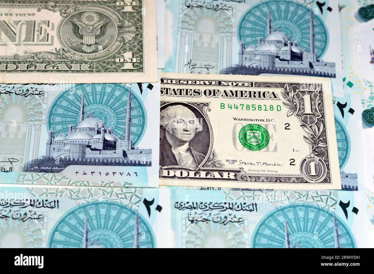 Background of USD American dollars money bills with the new Egyptian 20 ...