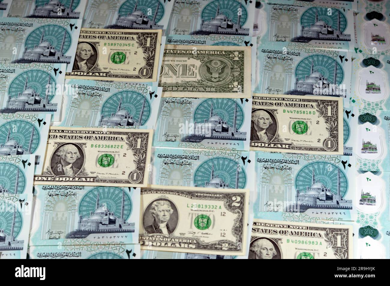 Background of USD American dollars money bills with the new Egyptian 20 ...