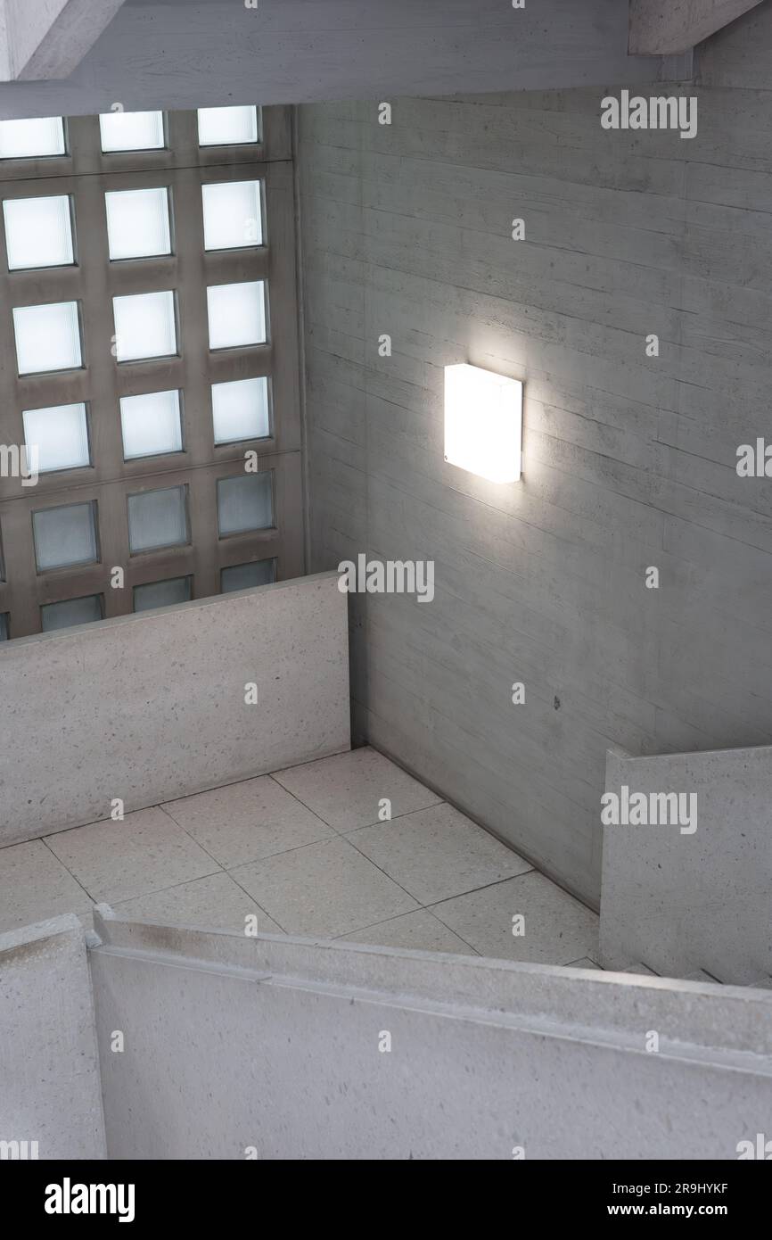 Concrete stairs in the hallway of an empty public access building ...