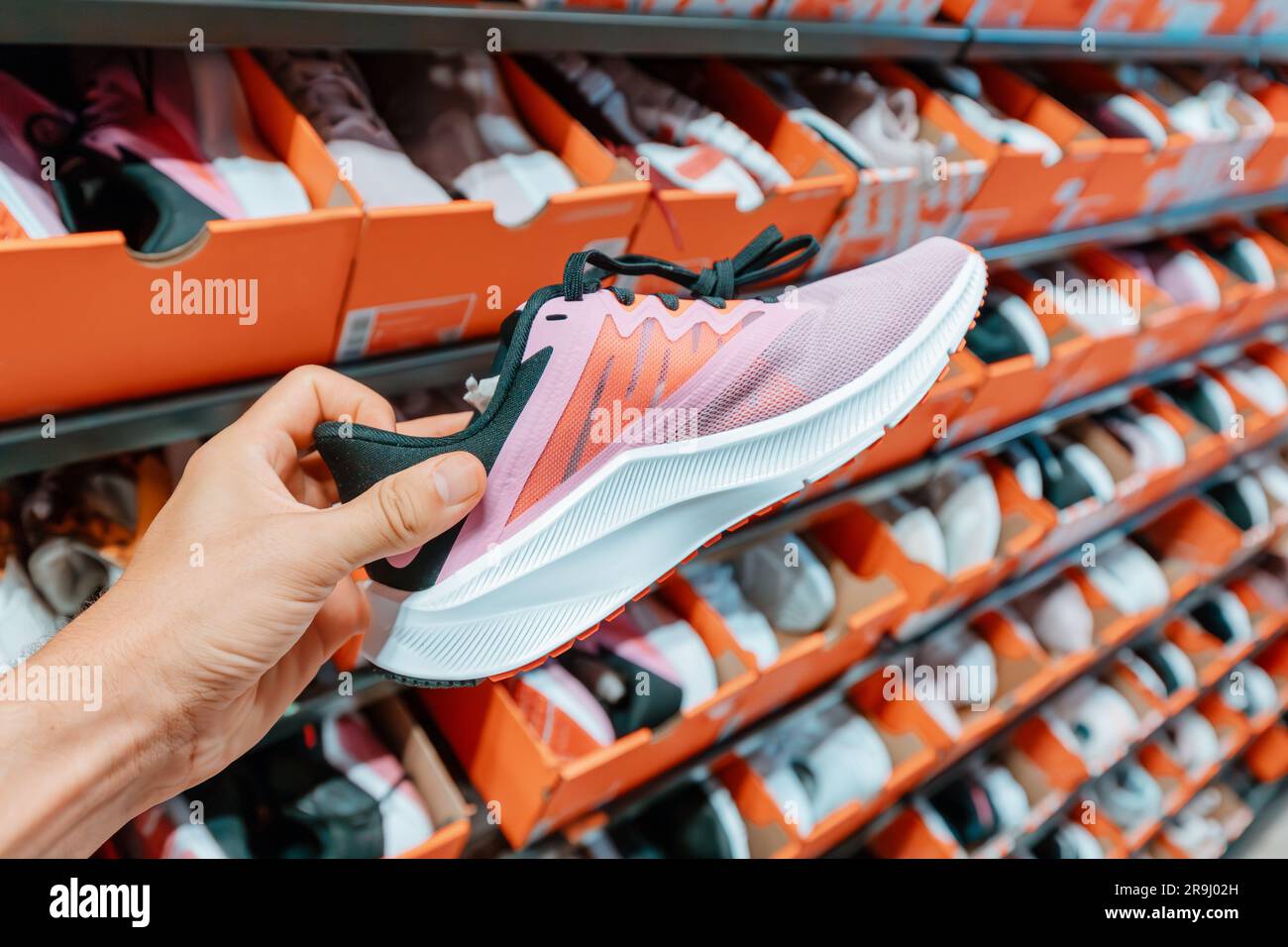 Man choosing shoes hi-res stock photography and images - Alamy