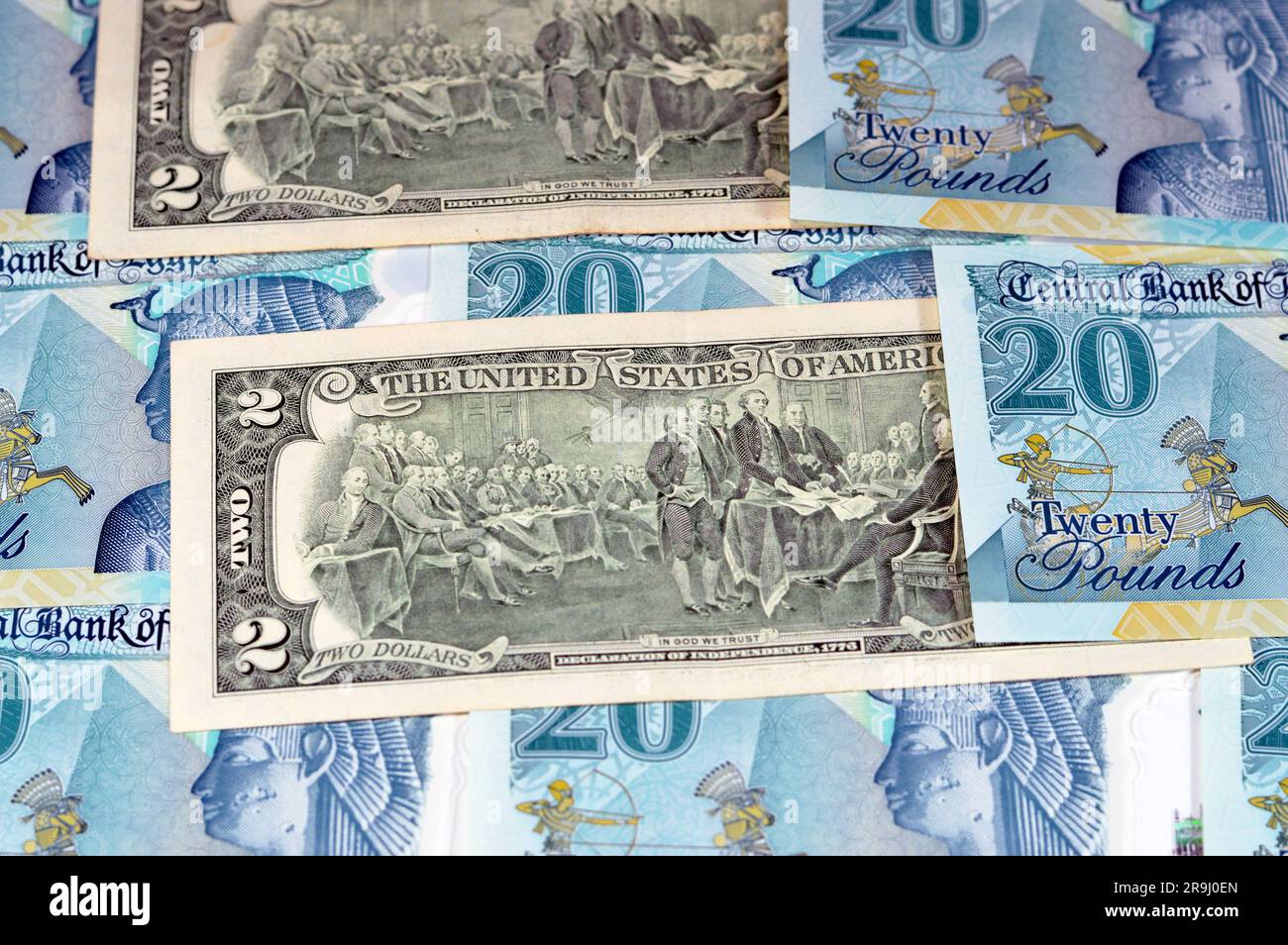 Background of USD American dollars money bills with the new Egyptian 20 ...