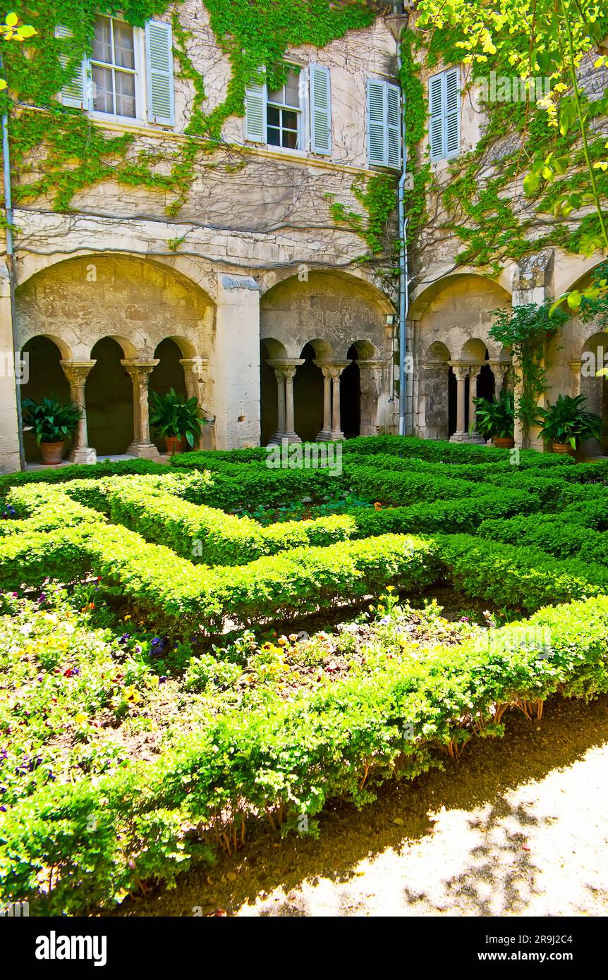 The ornamental garden in small medieval courtyard of Monastery of Saint ...