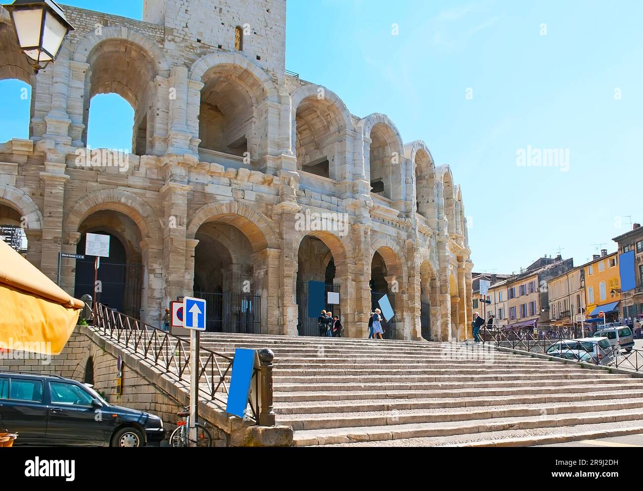 The ancient walls of Amphitheatre of Arles (Arenes d'Arles), located ...