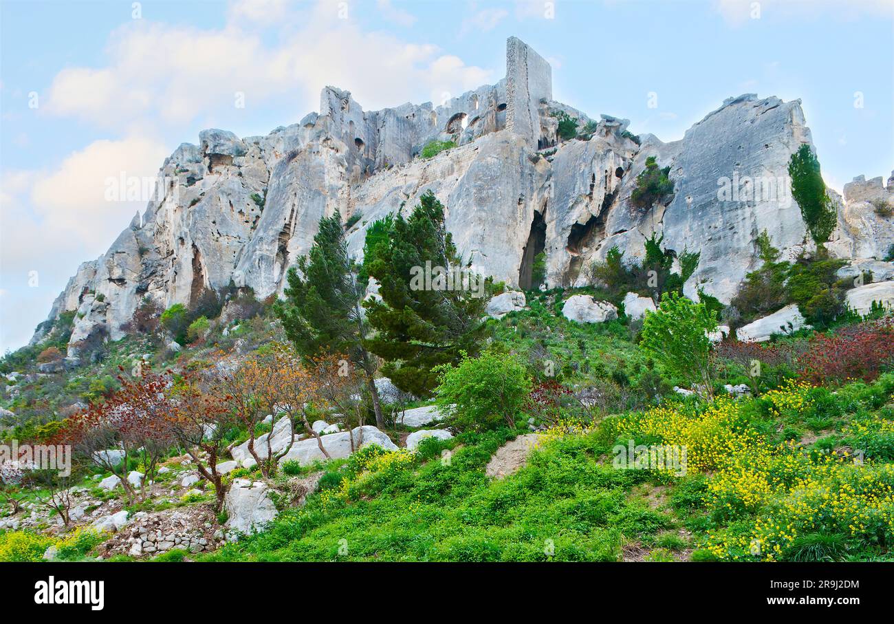 The limestone outcrop with medieval ruins of Chateau des Baux, one of ...