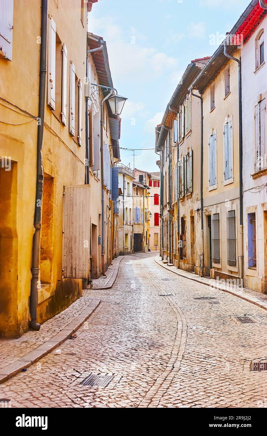 The pleasant walk in old Tarascon, local streets are narrow and winding ...
