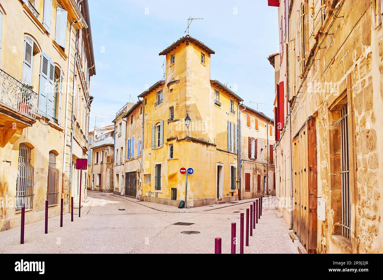 The scenic medieval house with a corner facade and tower, located in ...