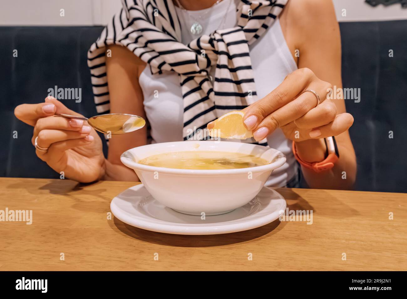 Eating vegetarian soup in outdoor cafe Stock Photo - Alamy