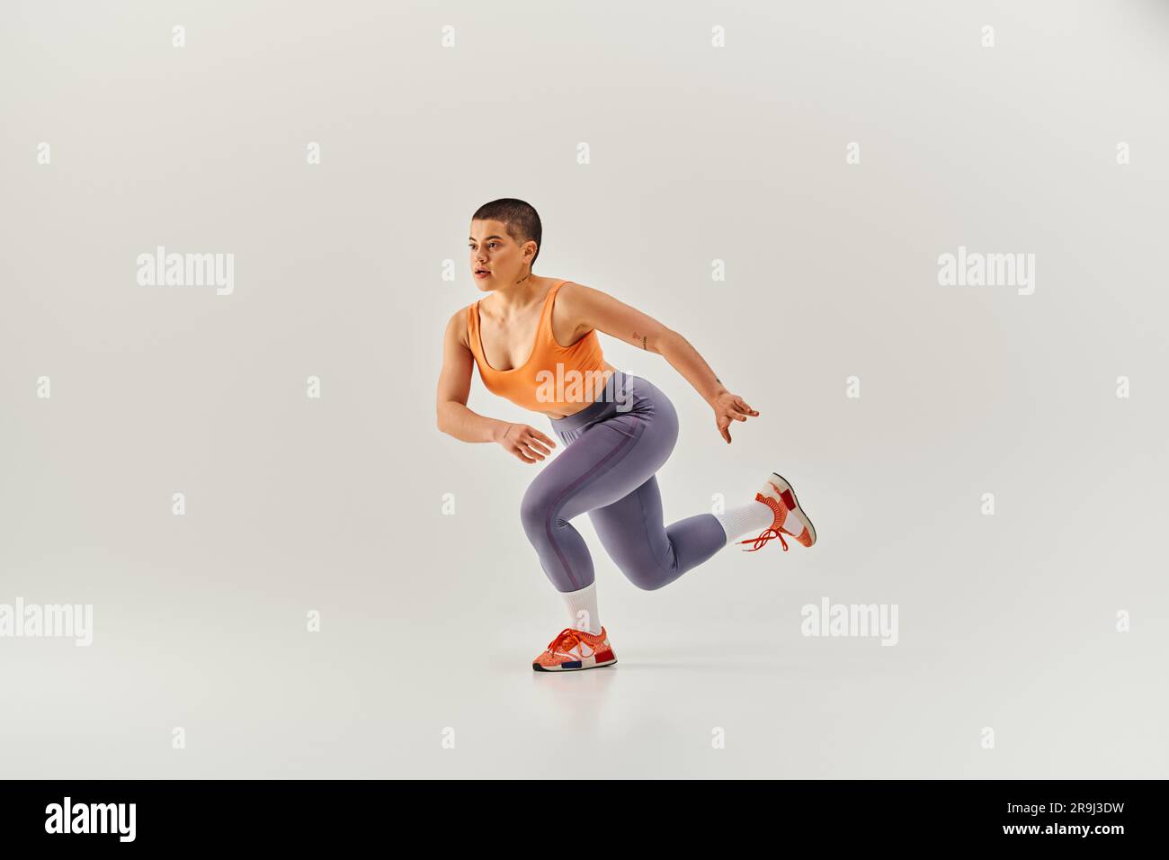 endurance, body positivity, short haired and curvy woman working out on ...