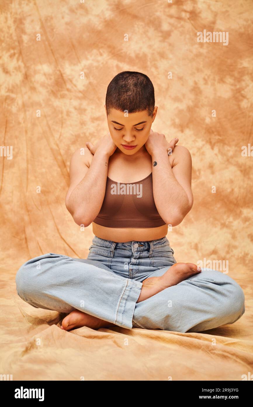 body confidence, relaxation, curvy young and tattooed woman in jeans ...