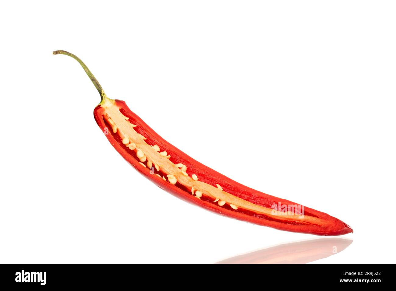 One half pod of hot red pepper, macro, isolated on white background ...