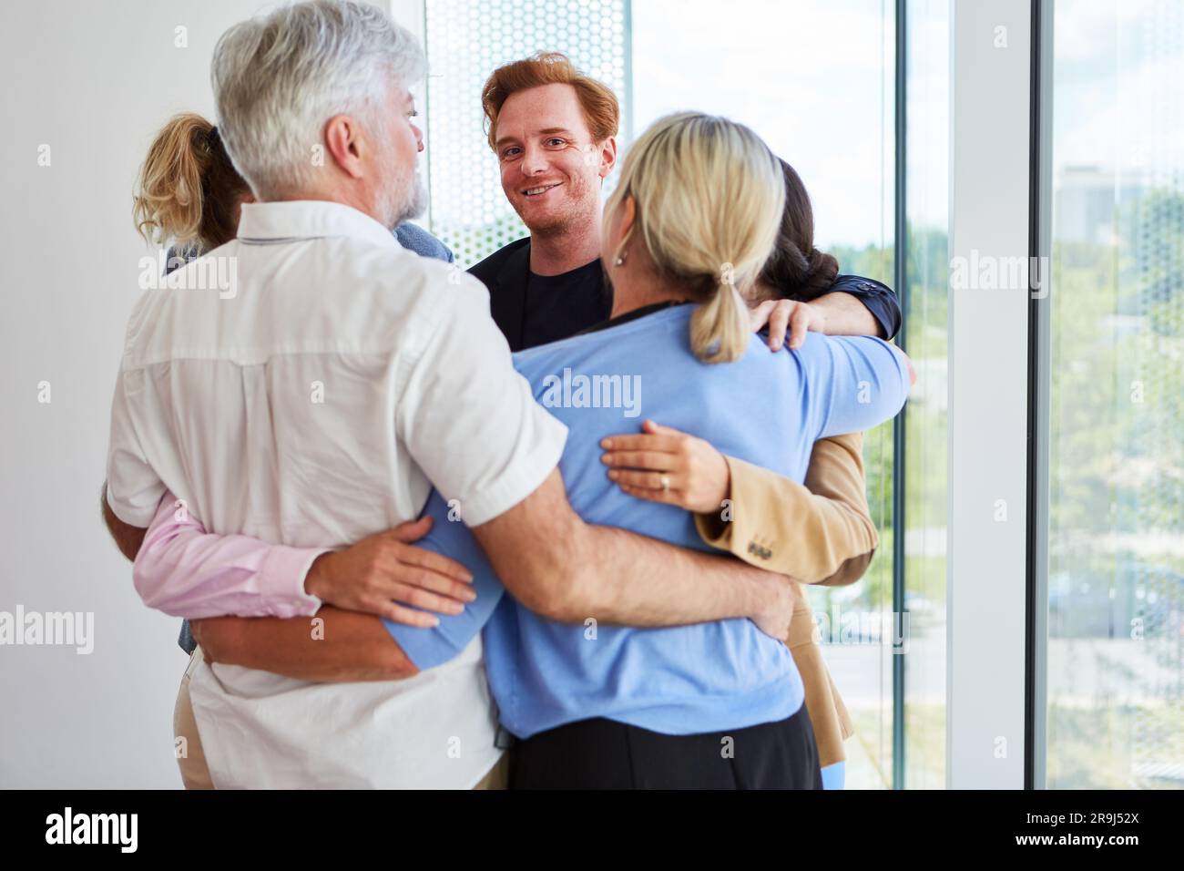 Team smiling together hi-res stock photography and images - Alamy