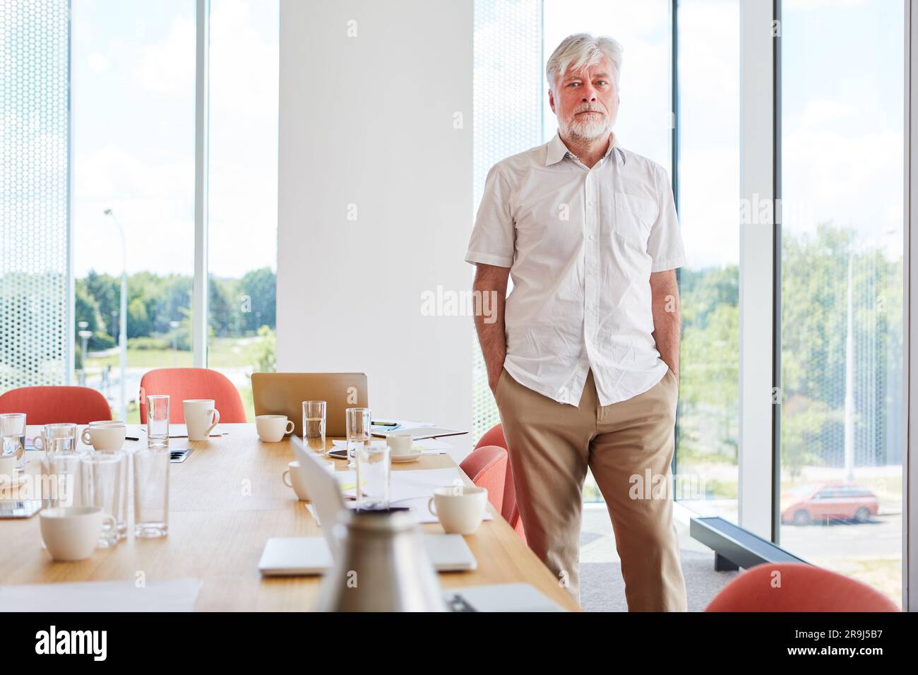 Man walking with hands in pockets hi-res stock photography and images ...