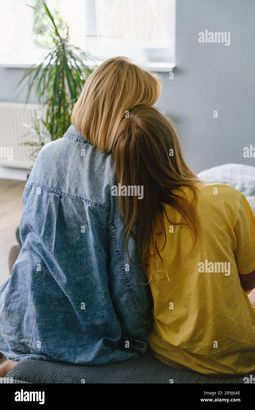 Young Loving Mother Hugging Her Teenage Daughter Mom Demonstrating