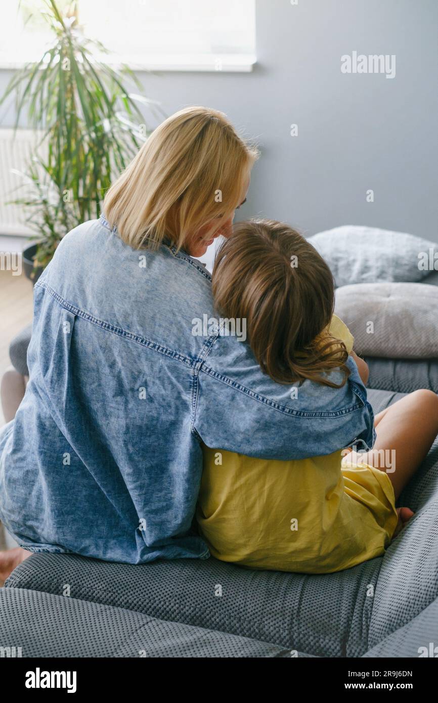 Young Loving Mother Hugging Her Teenage Daughter Mom Demonstrating