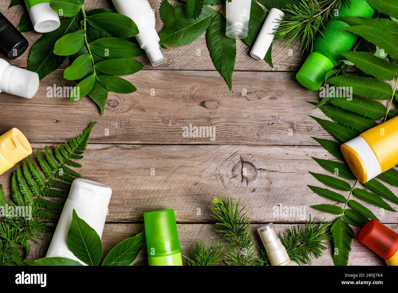 Mosquito repellent products and sprays anti stinging insects on wooden ...