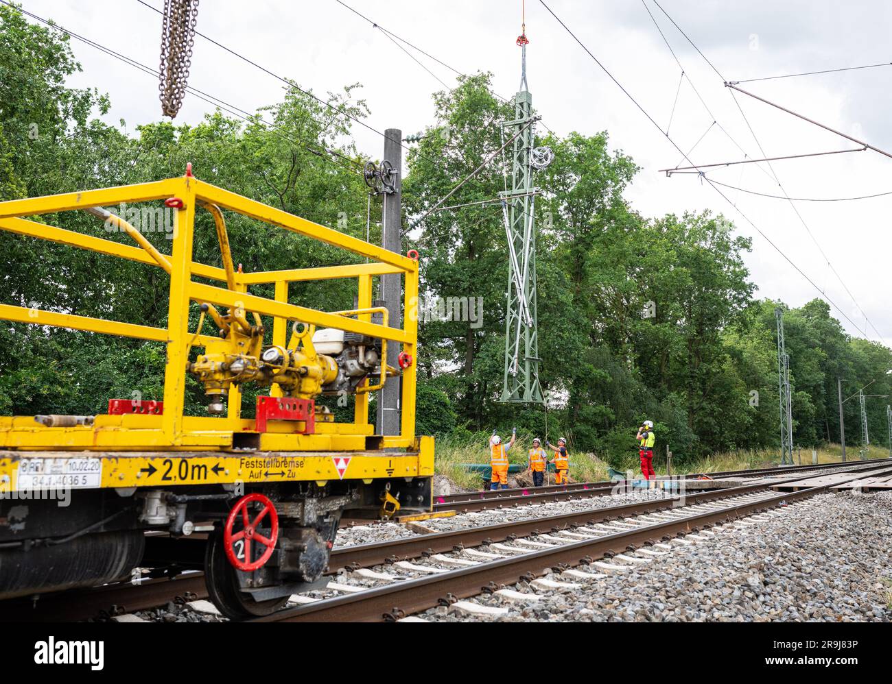 Rheine, Germany. 27th June, 2023. A catenary mast suspended from a ...