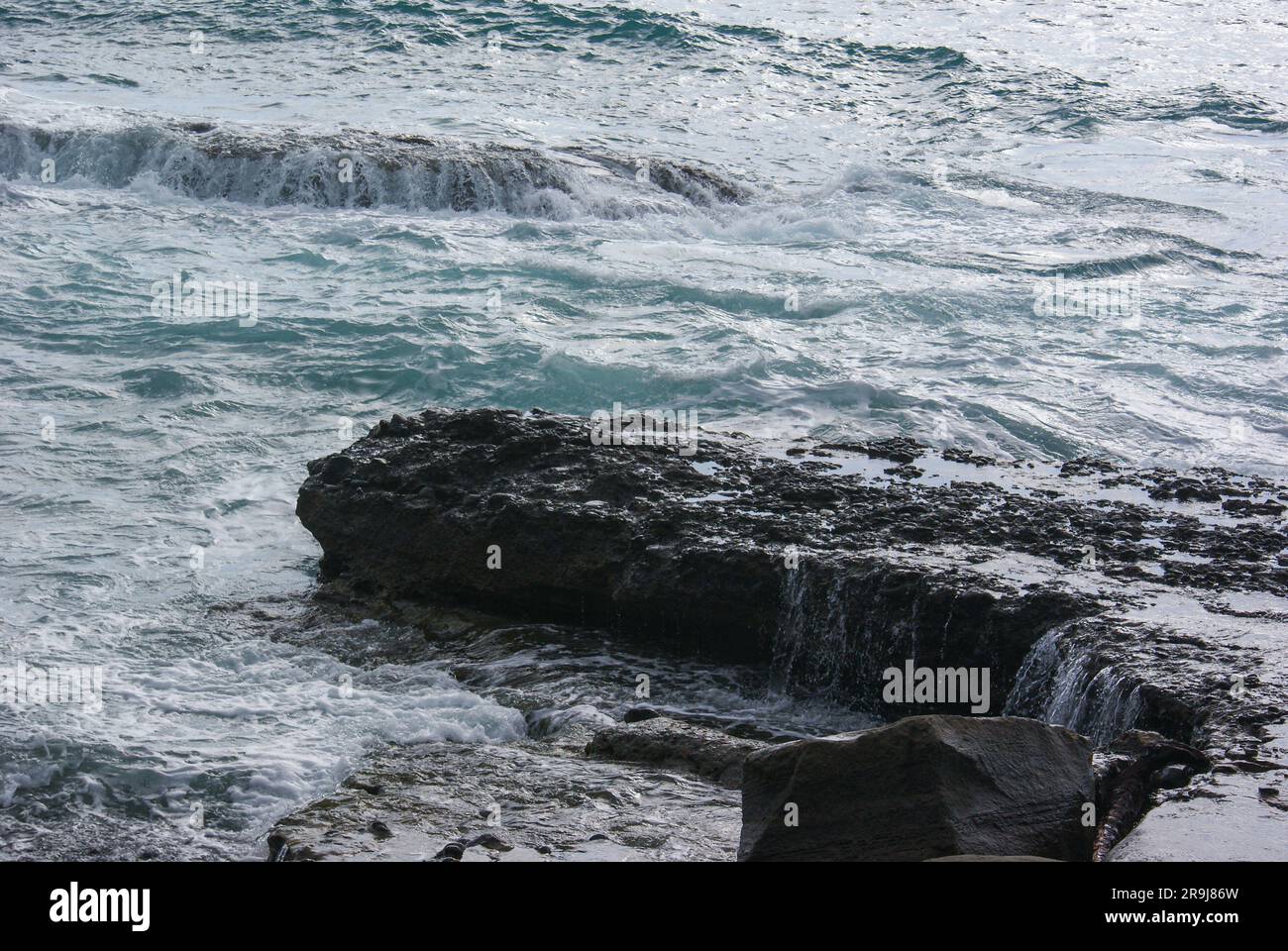 Aerial cliff rocks on shoreline hi-res stock photography and images - Alamy