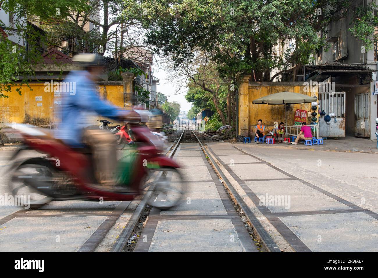 Hanoi, Vietnam-April 2023; Low angle view of busy road with scooter in ...