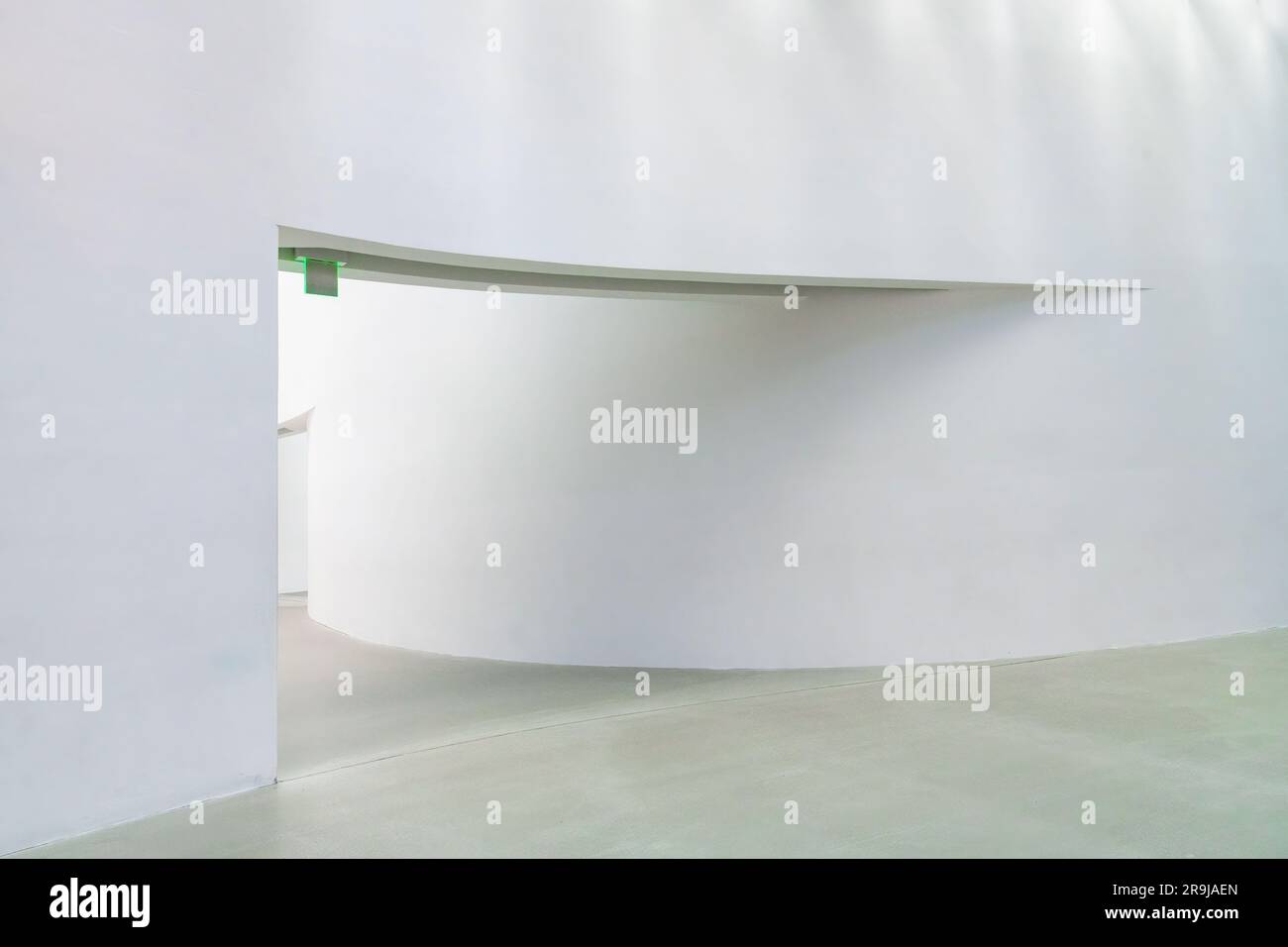 Corning, NY, USA-April 2023; Interior view of the curved white walls ...