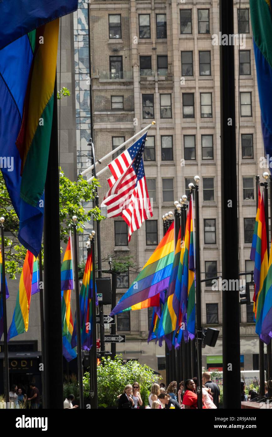 Pride month flags surround the plaza in Rockefeller Center, New York City, USA June 2023 Stock ...