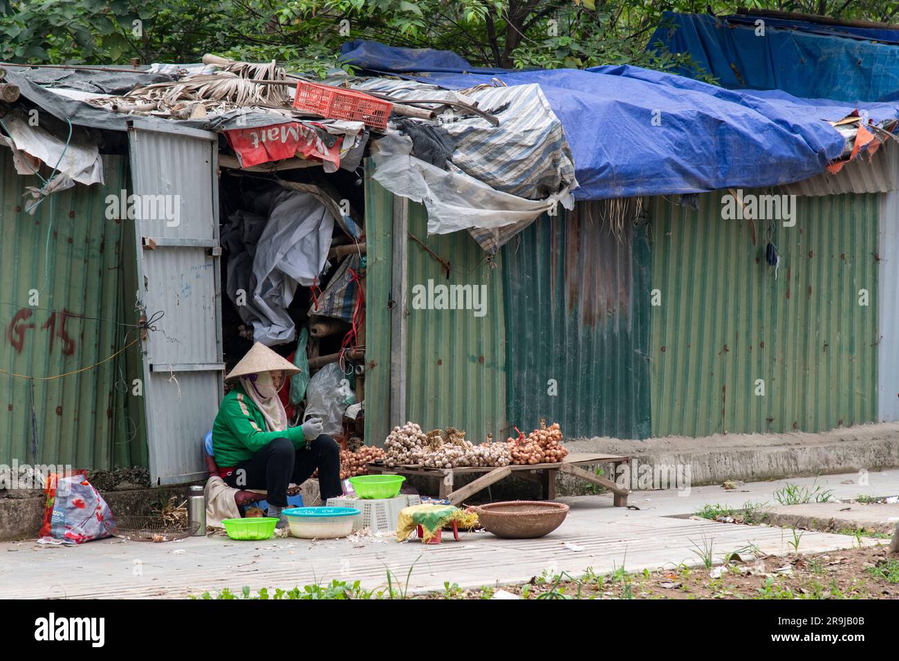 Hanoi, Vietnam-April 2023; Street vendor in one of the neighborhoods of ...